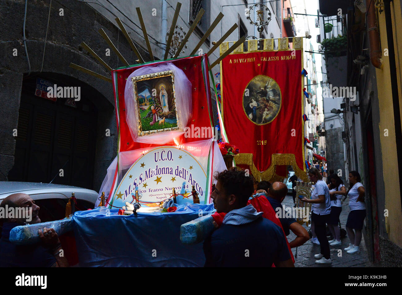 A procession bearing inages of Mary, the mother of Jesus, makes its way ...