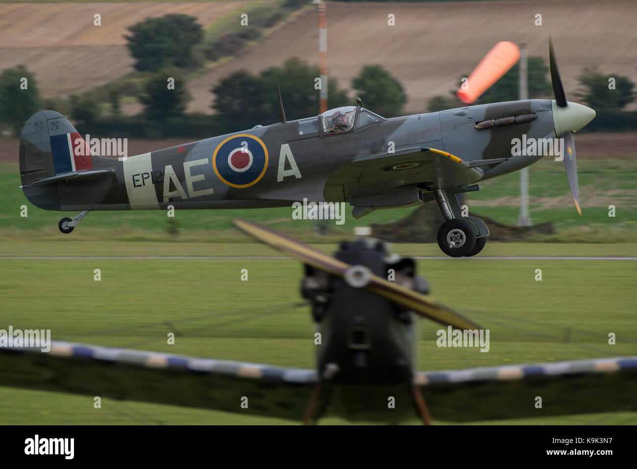 Duxford, UK. 23rd Sep, 2017. A formation of 12 spitfires forms up ...