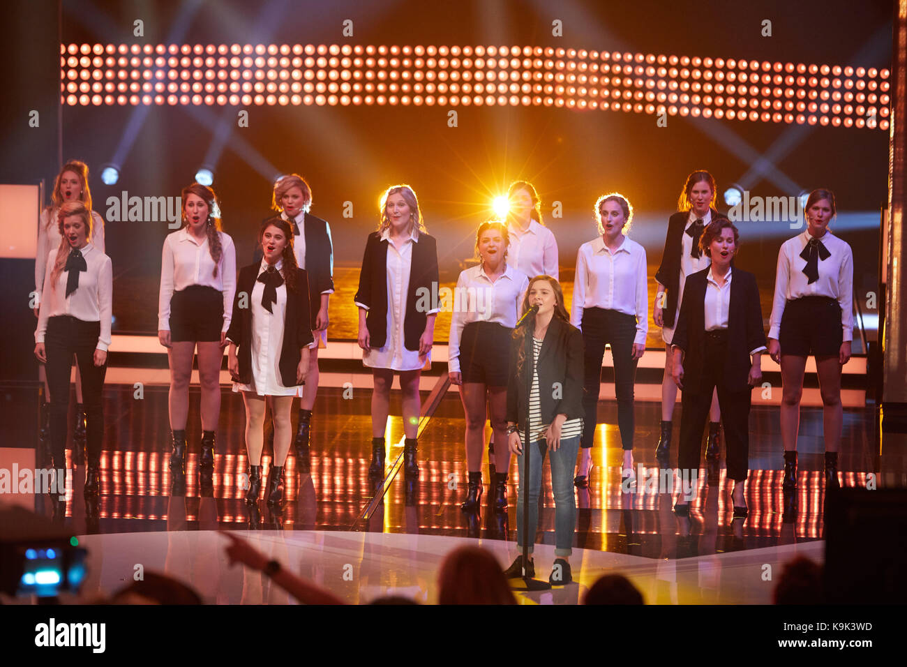 Hamburg, Germany. 21st Sep, 2017. Singer Sofie (R) and the Scala Choir ...