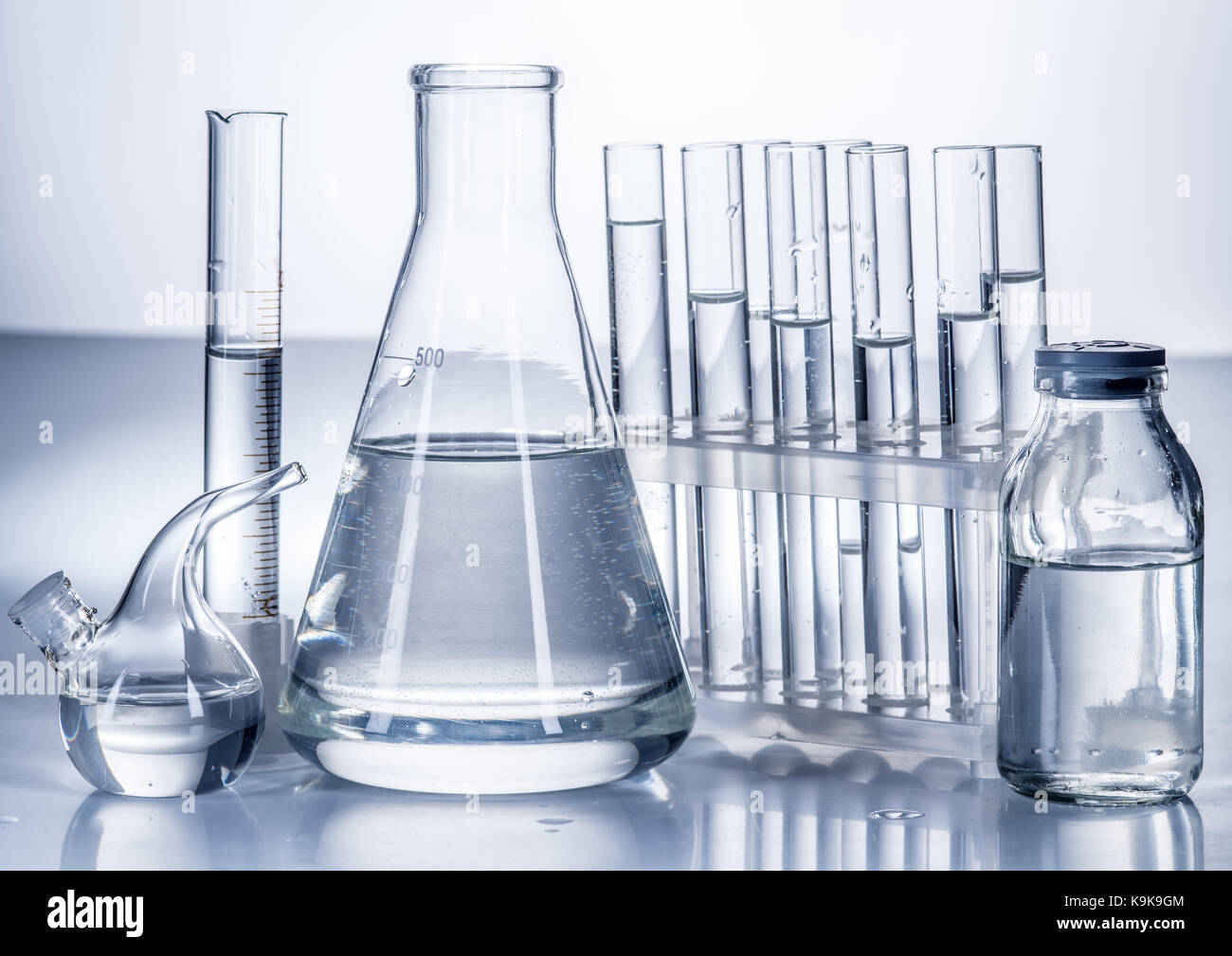 Different laboratory beakers and glassware. Monochrome Stock Photo - Alamy