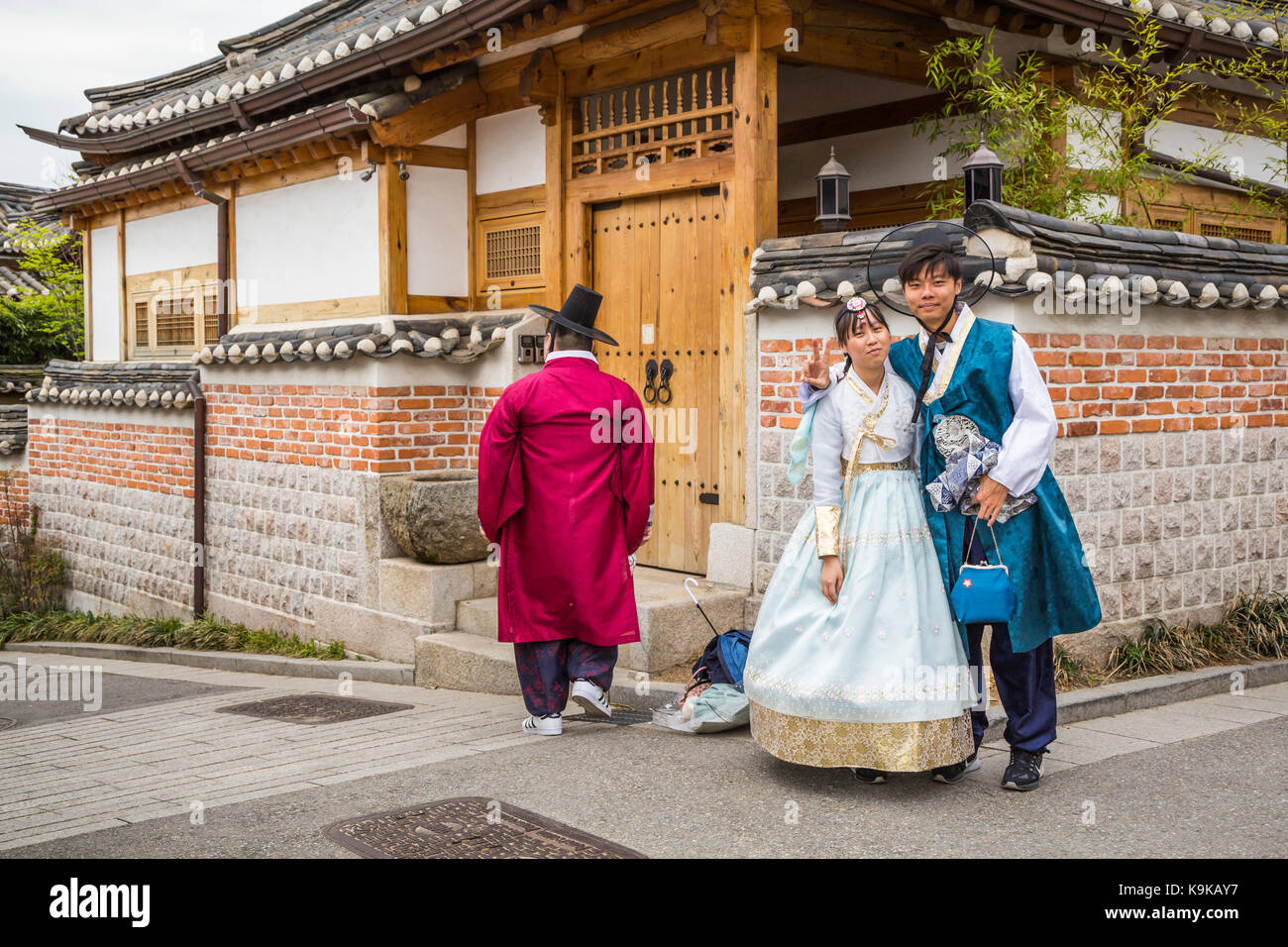 Koreans in traditional dress in Bukchok Hanok Village, Seoul, South ...