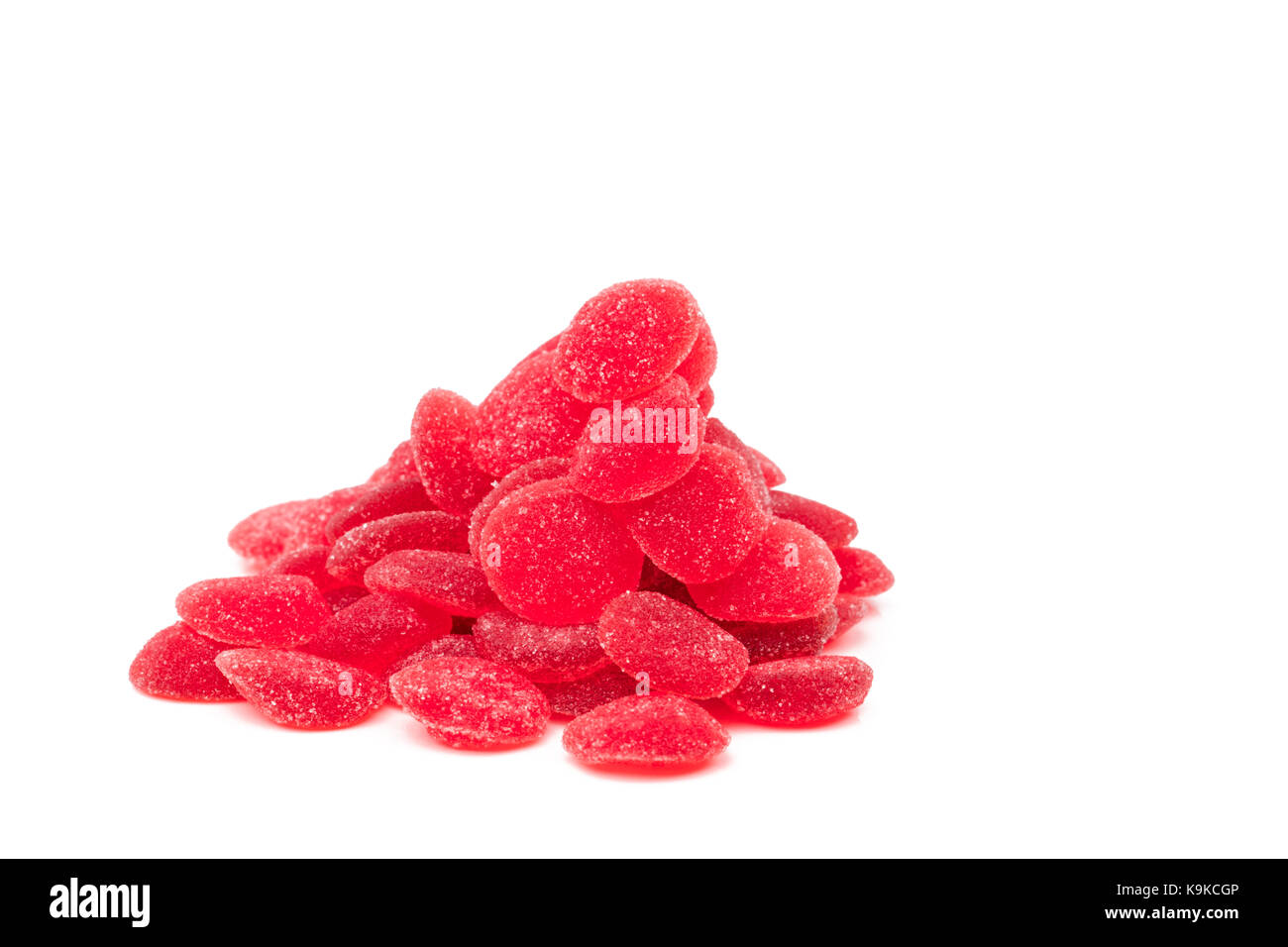 Pile of red vitamin pastille with clipping path. Multivitamin gummy for ...