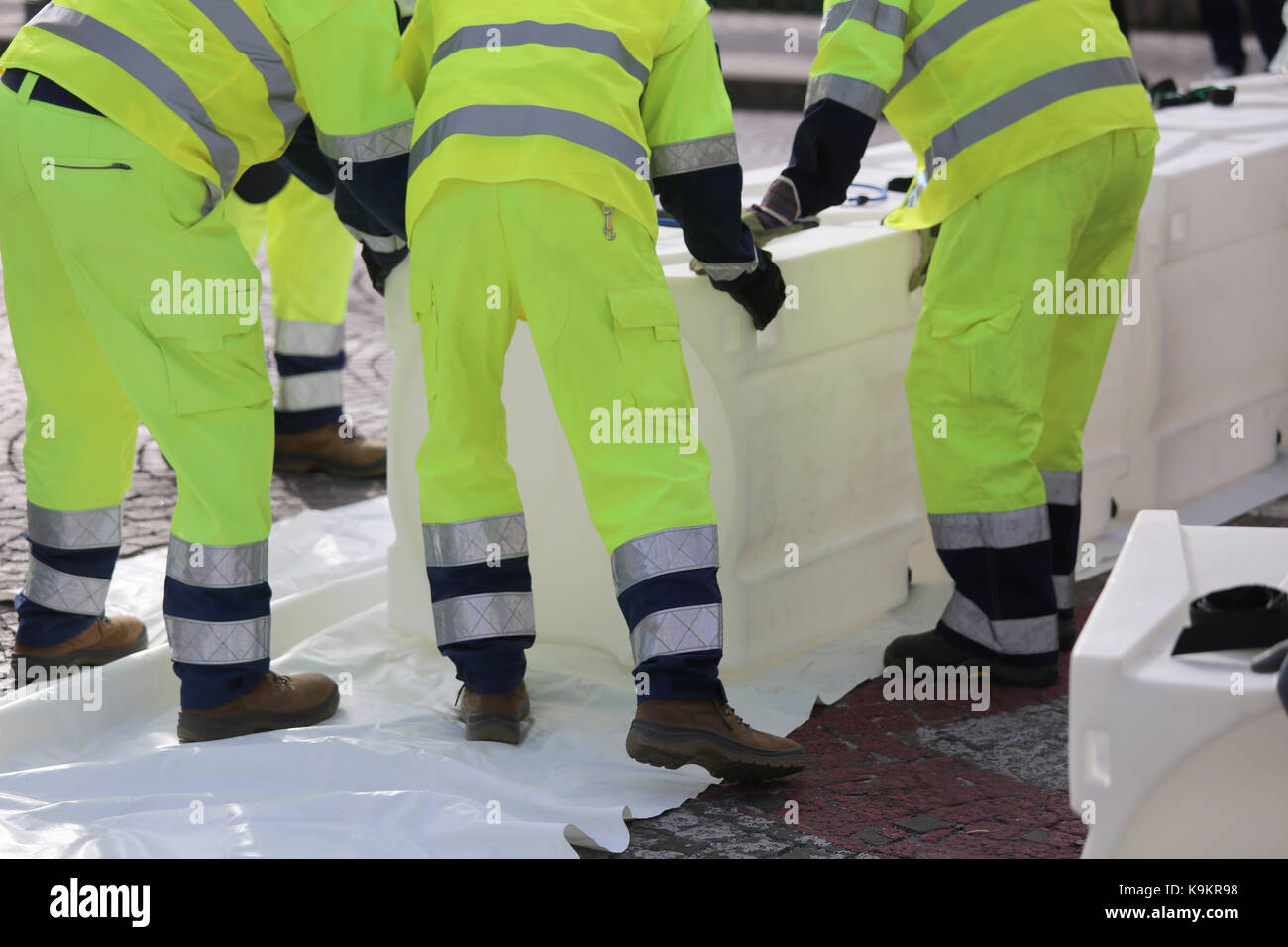 civil protection men with high visibility clothing during an exercise ...