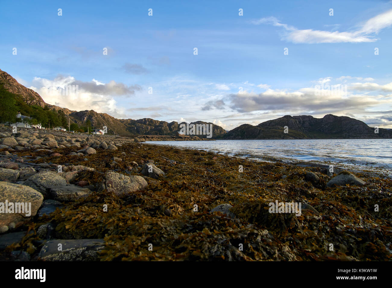 Beach and view of Loch Diabaig below the village of Lower Diabaig ...