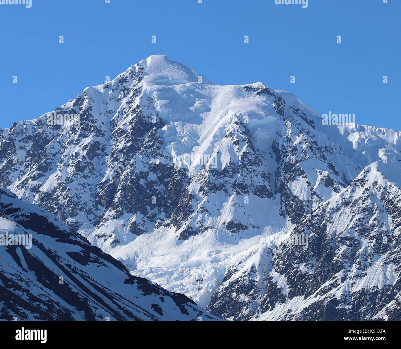 Rugged snow capped mountain hi-res stock photography and images - Alamy