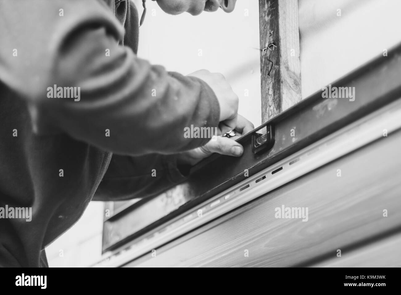 Use of the measuring tool for level installation Stock Photo - Alamy