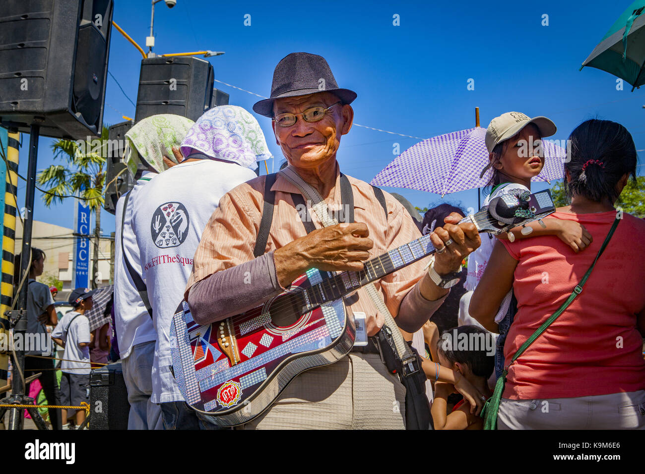Filipino playing guitar hi-res stock photography and images - Alamy