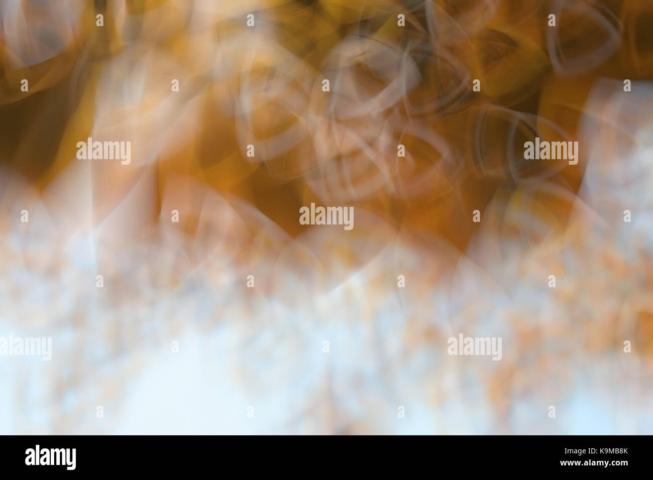 Orange abstract background blurred round objects Stock Photo - Alamy