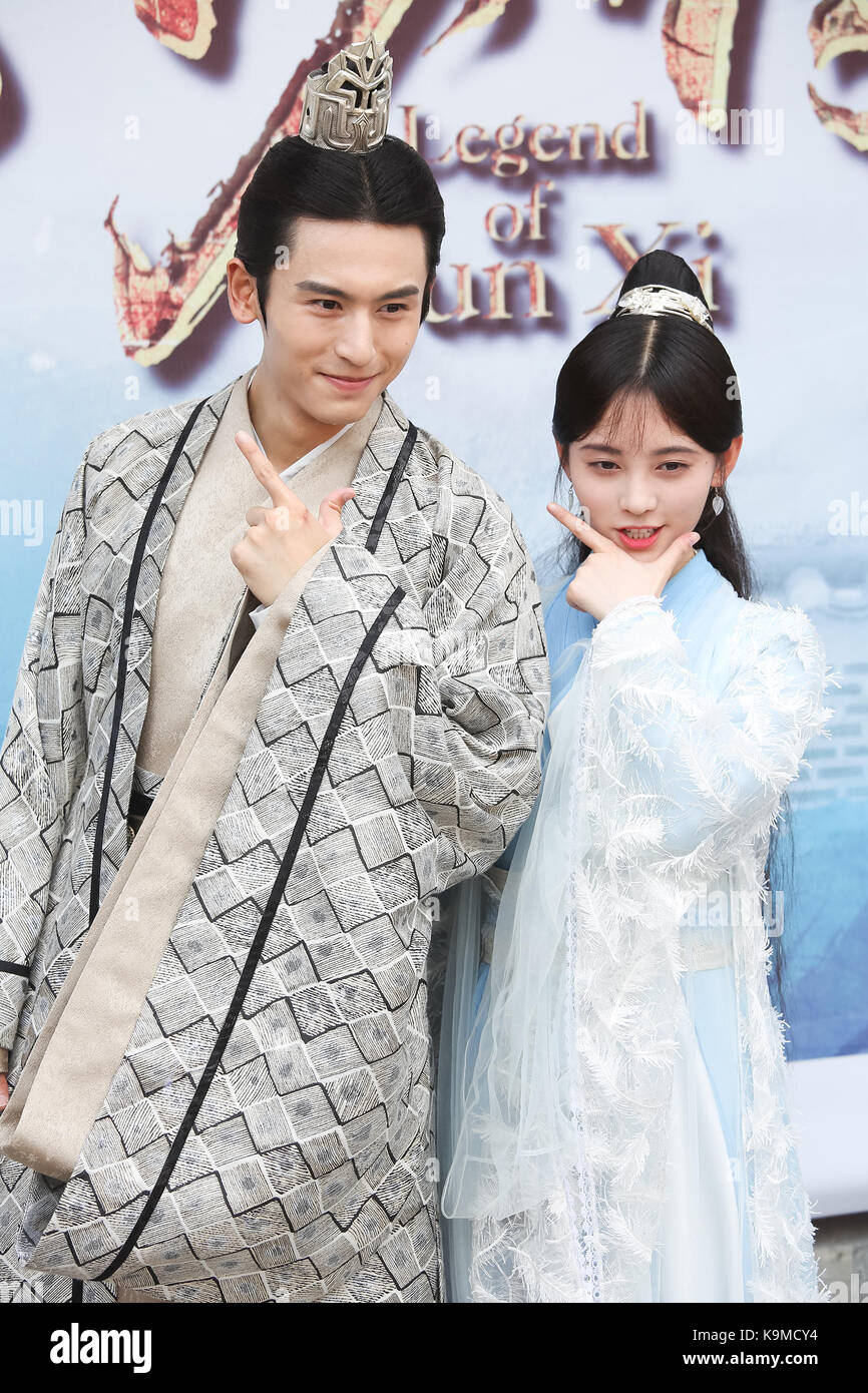 Chinese singer and actress Ju Jingyi, right, of Chinese girl group ...