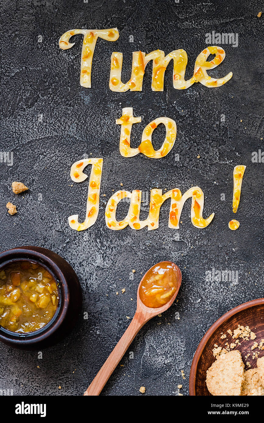 Food typography Time to Jam on dark background. Orange jam lettering ...