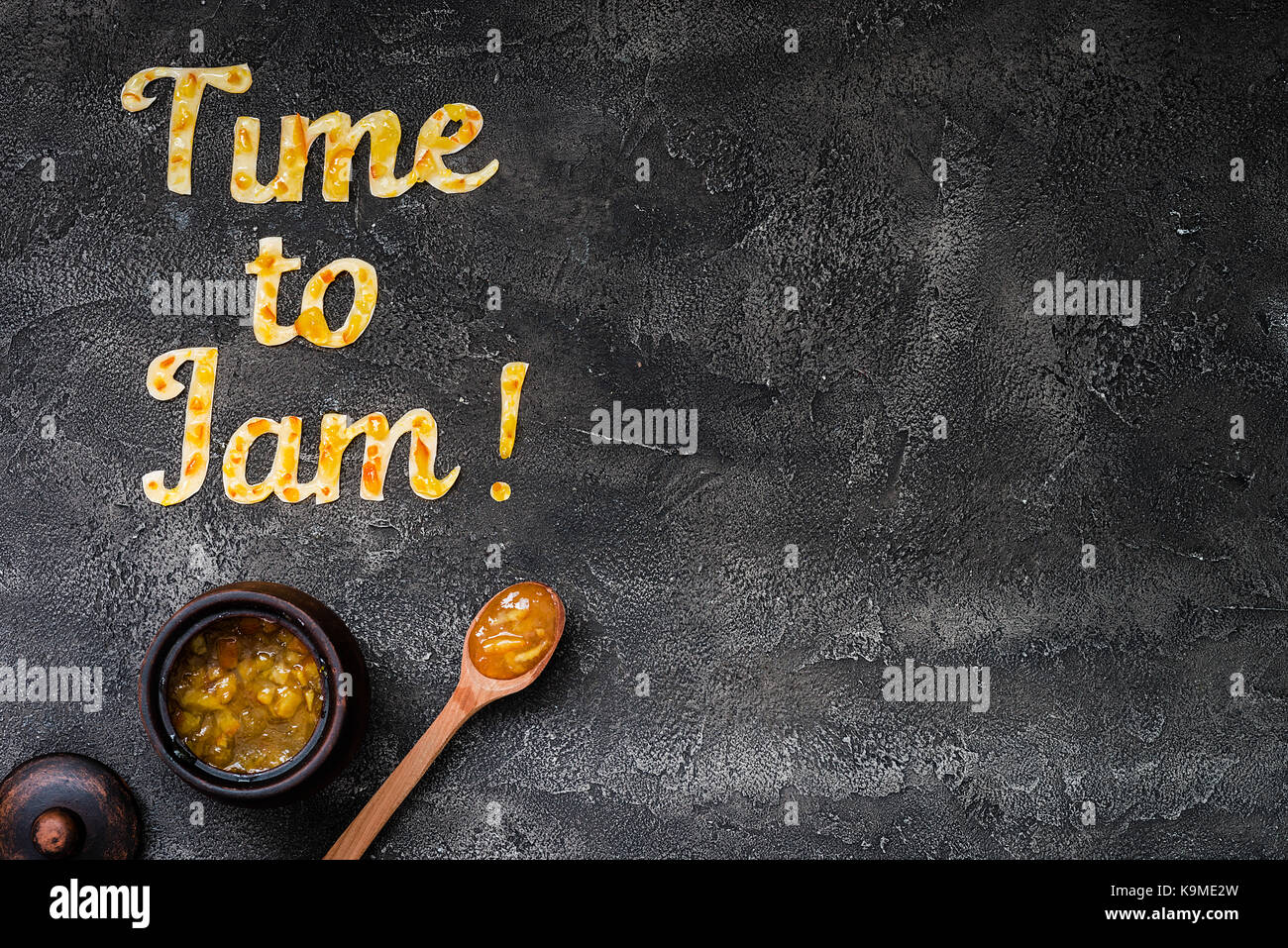 Food typography Time to Jam on dark background with copy space. Orange ...