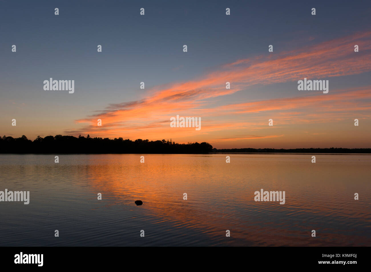 Sunset above Lake Quannapowitt, Wakefield, MA USA Stock Photo - Alamy