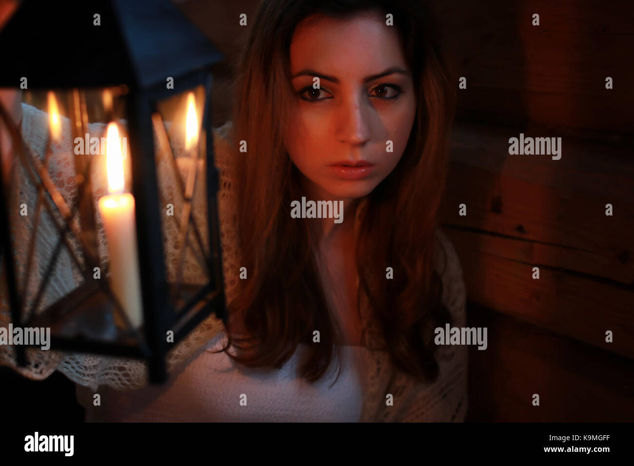 woman candle lamp dark night Stock Photo - Alamy