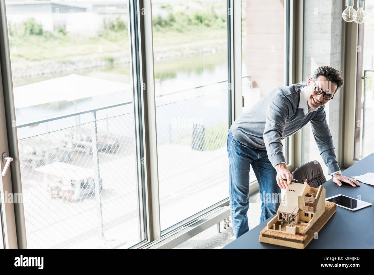 Architect working on architectural model Stock Photo - Alamy