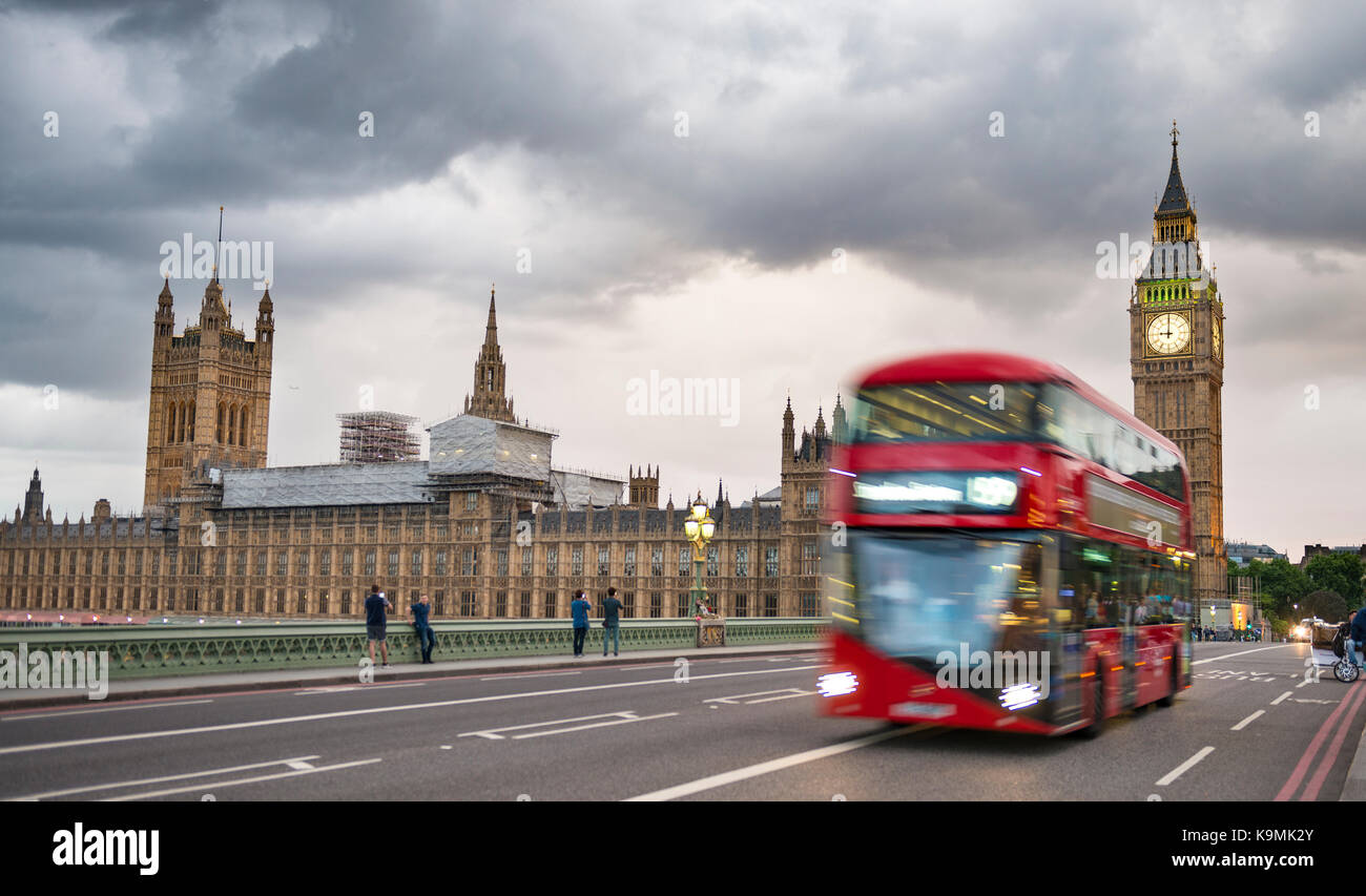 Red double-decker bus on the Westminster Bridge, Palace of Westminster ...