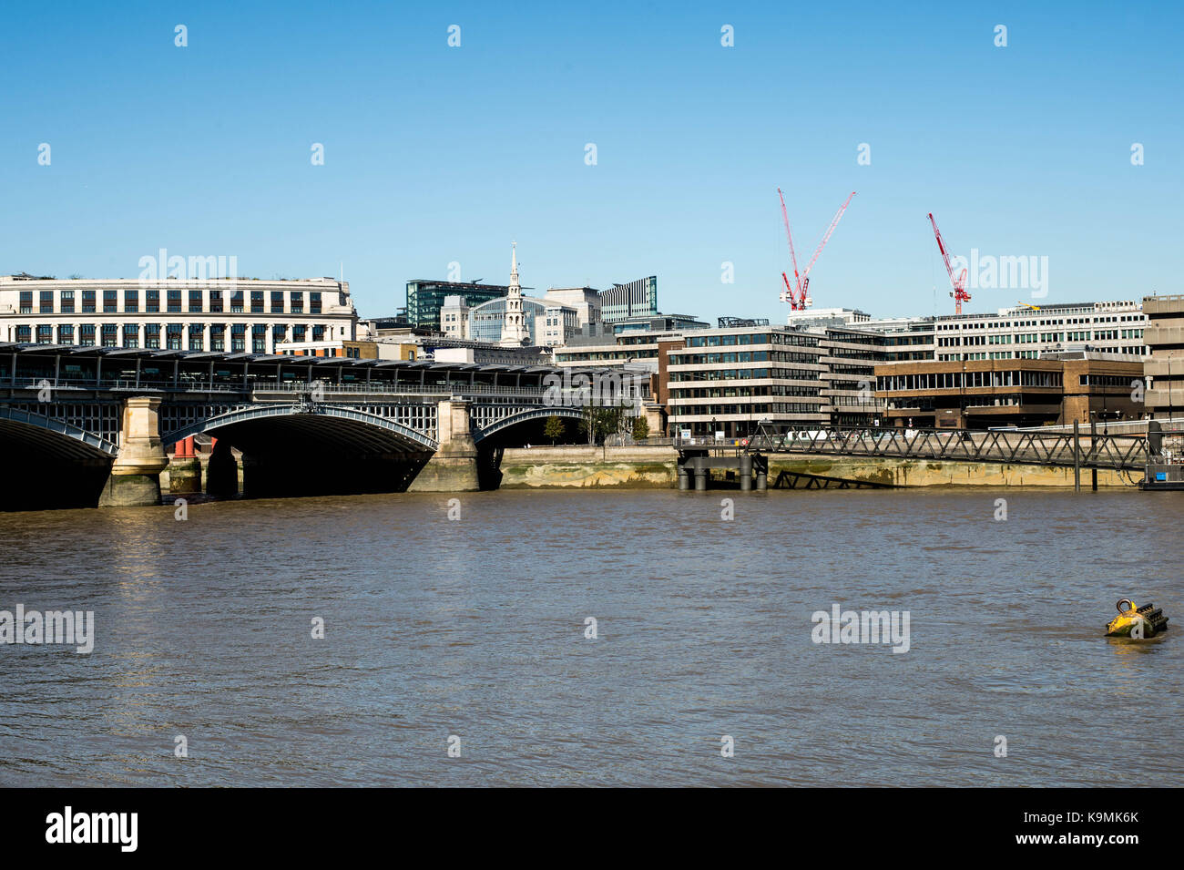 The Iron Arches of Blackfriars Railway Bridge Crossing the River Thames ...