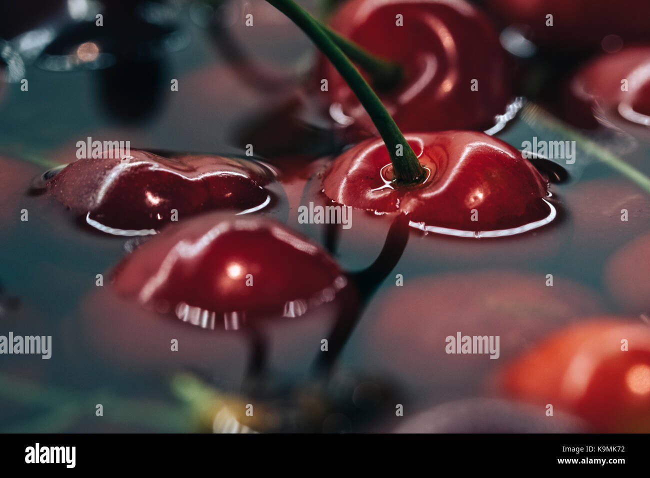 Cherries in water Stock Photo - Alamy