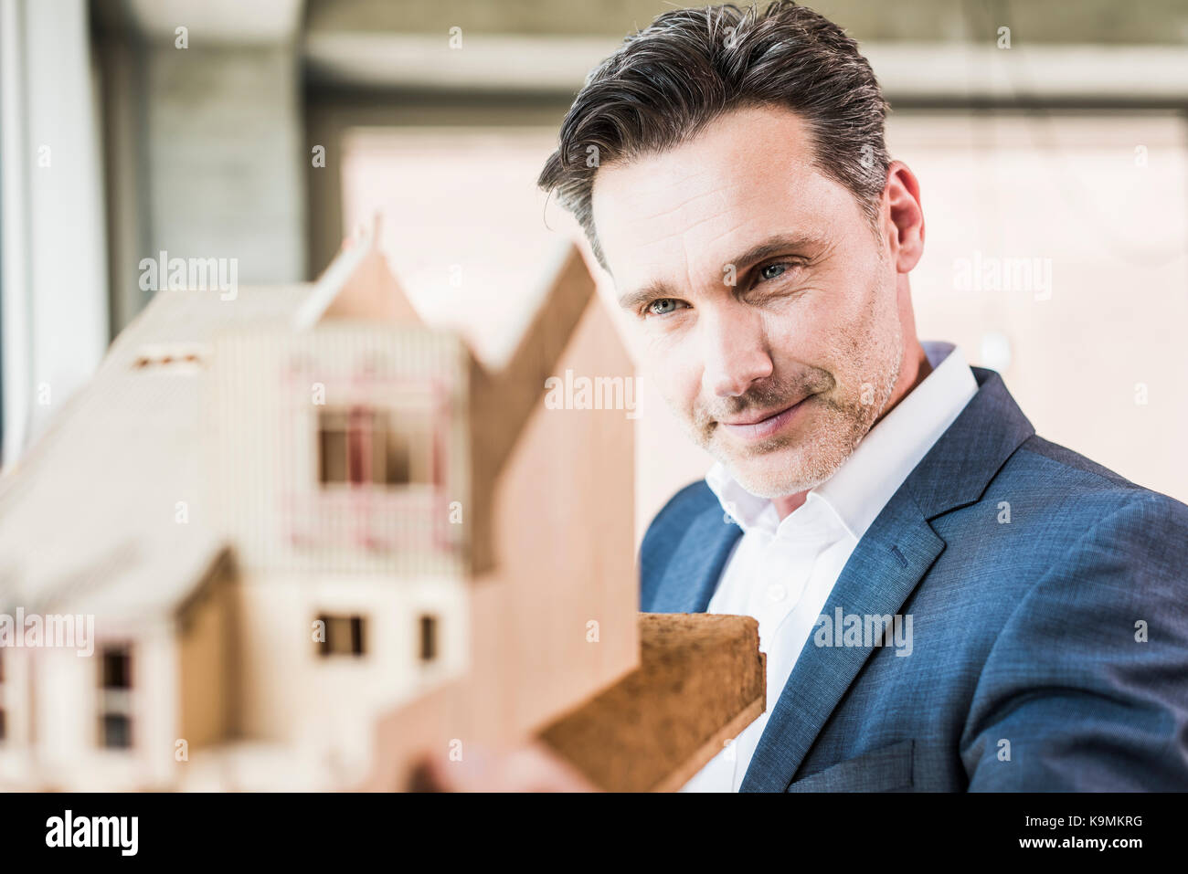 Architect working on architectural model Stock Photo - Alamy