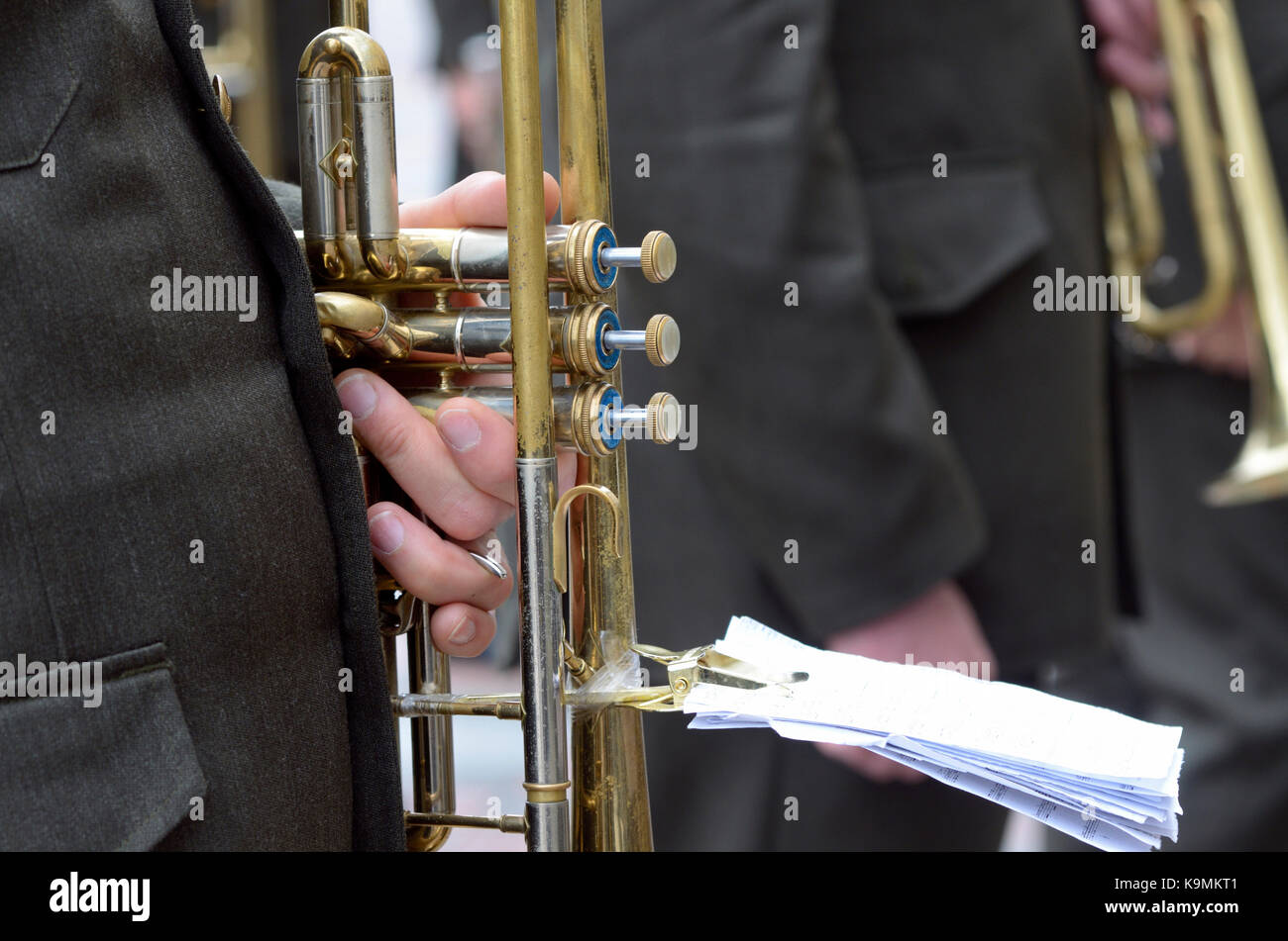 Hand holding trumpet hi-res stock photography and images - Alamy