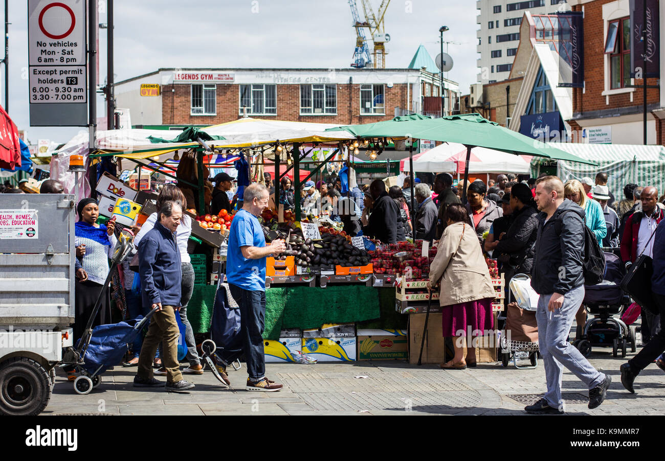 People throng in an urban market Stock Photo - Alamy