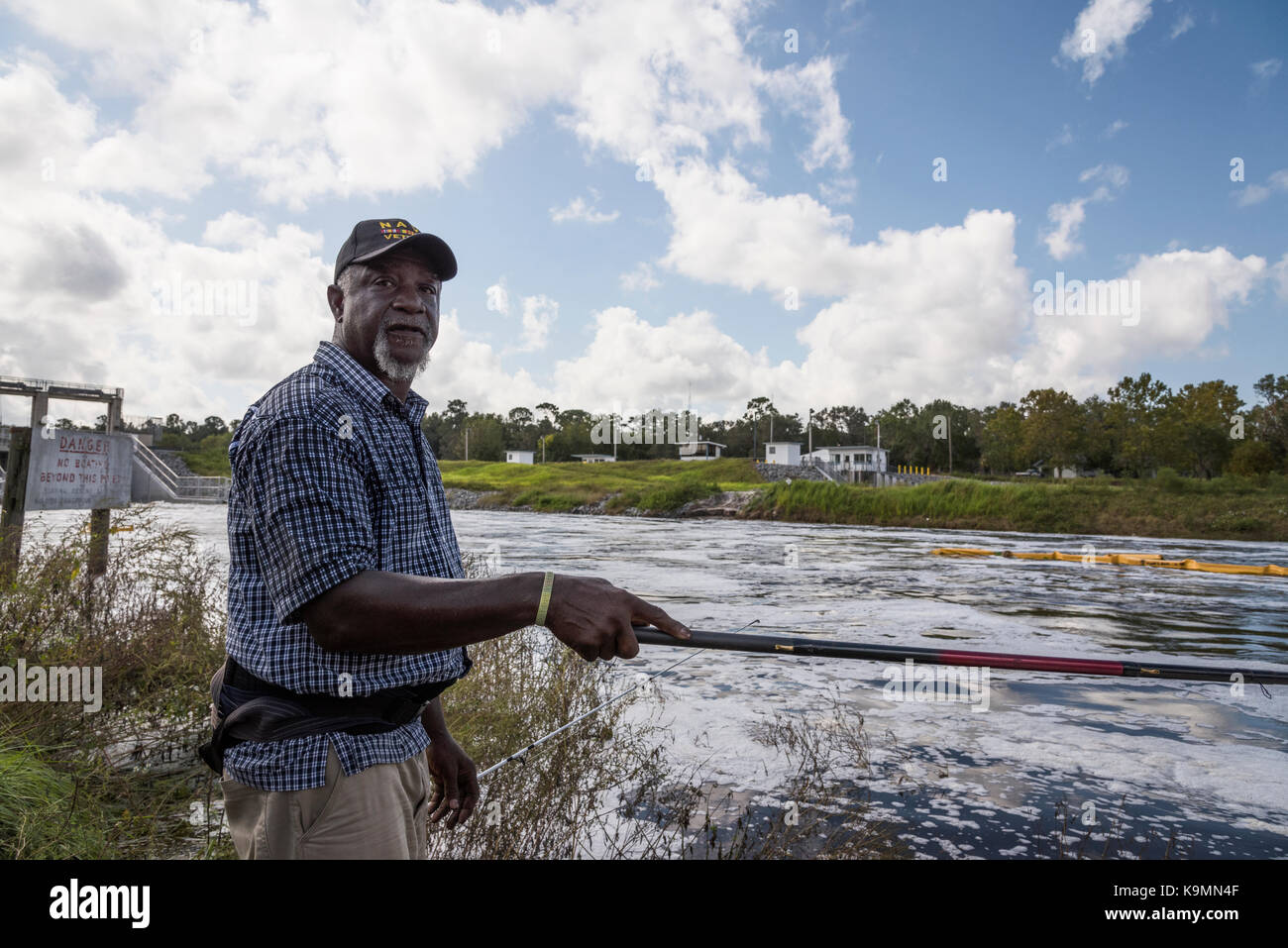 Men fishing the Moss Bluff Spillway in Marion County, Florida with the ...