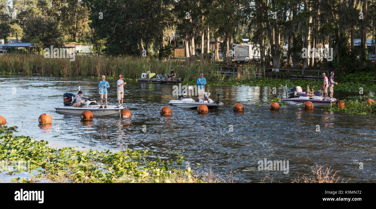 Fishermen at the Burrell Spillway in Leesburg, Florida fishing the ...