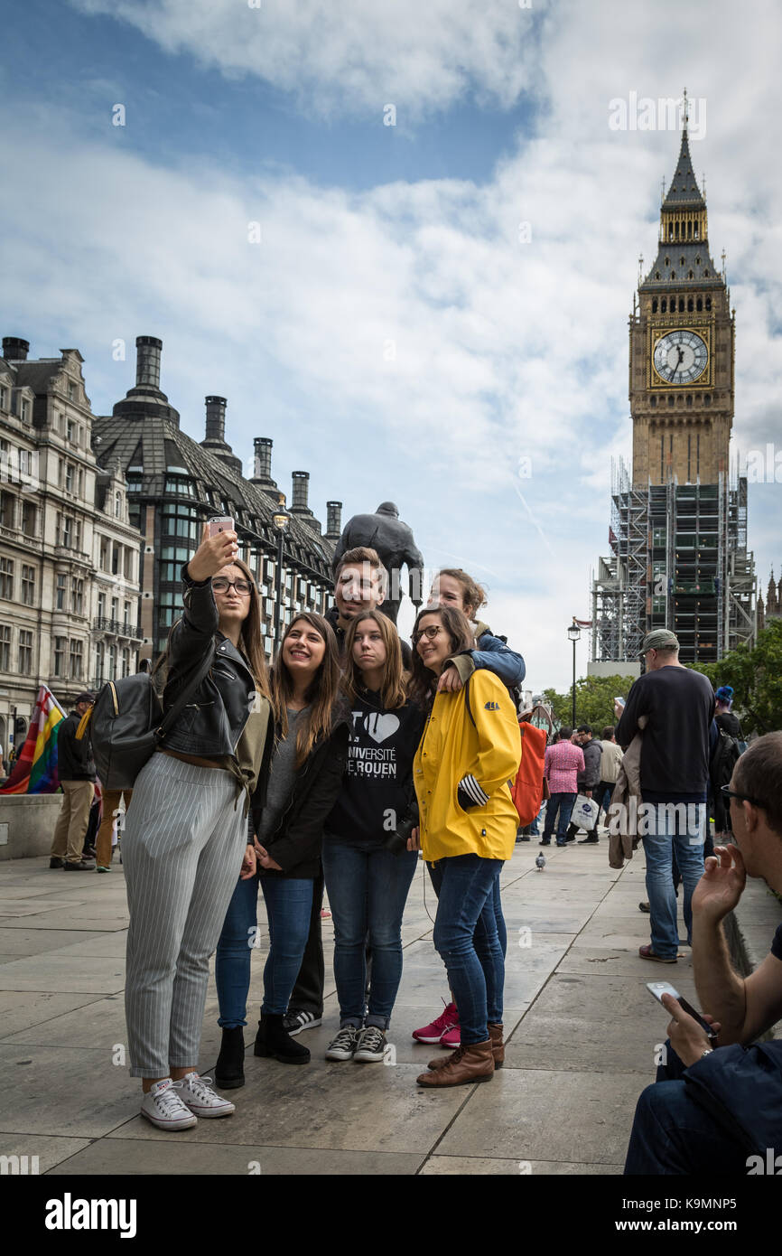 Tourists take selfie photos in Parliament Square in front of Big Ben ...