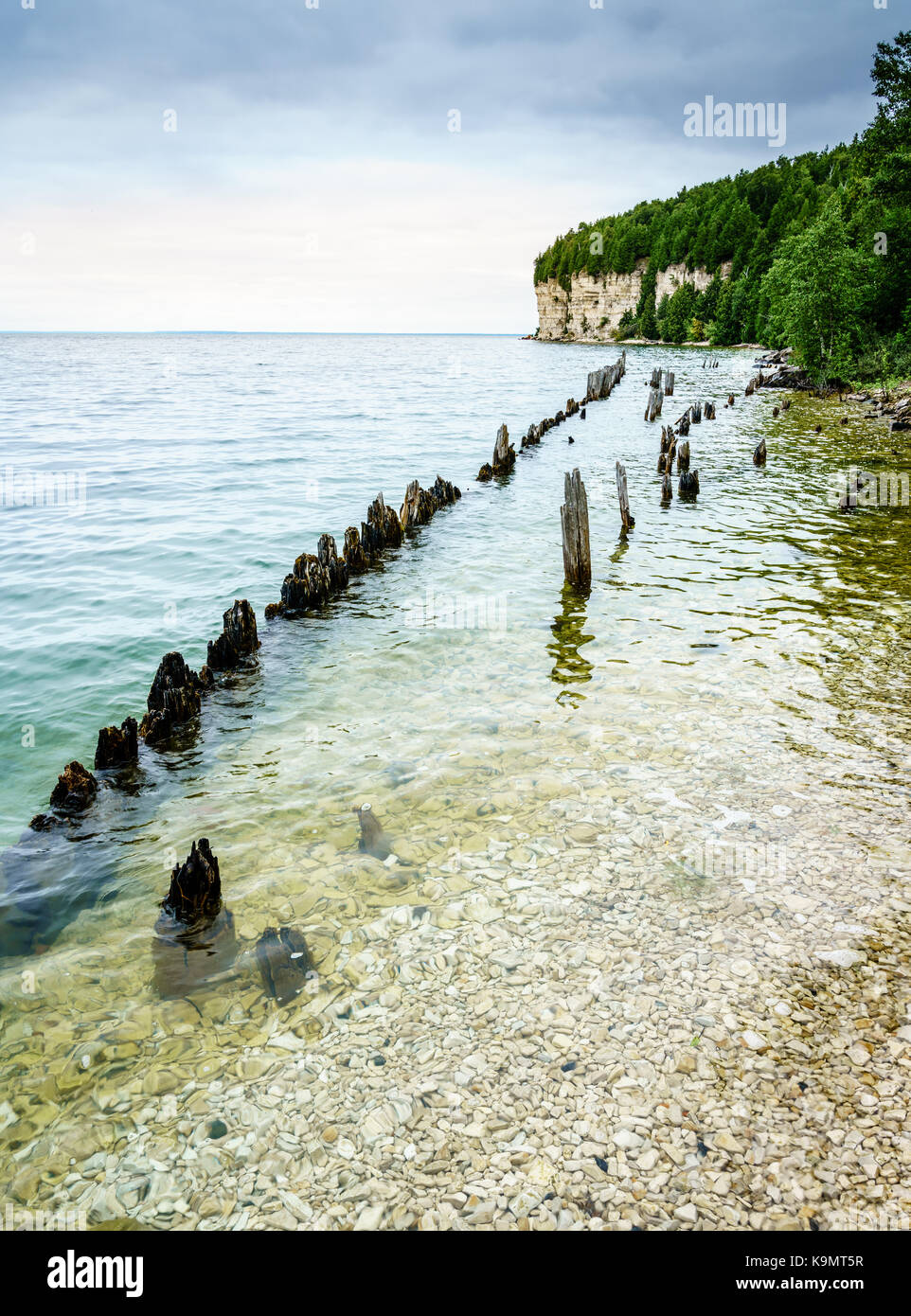 Remnants of docks in Fayette Historic Townsite in Michigan Stock Photo ...