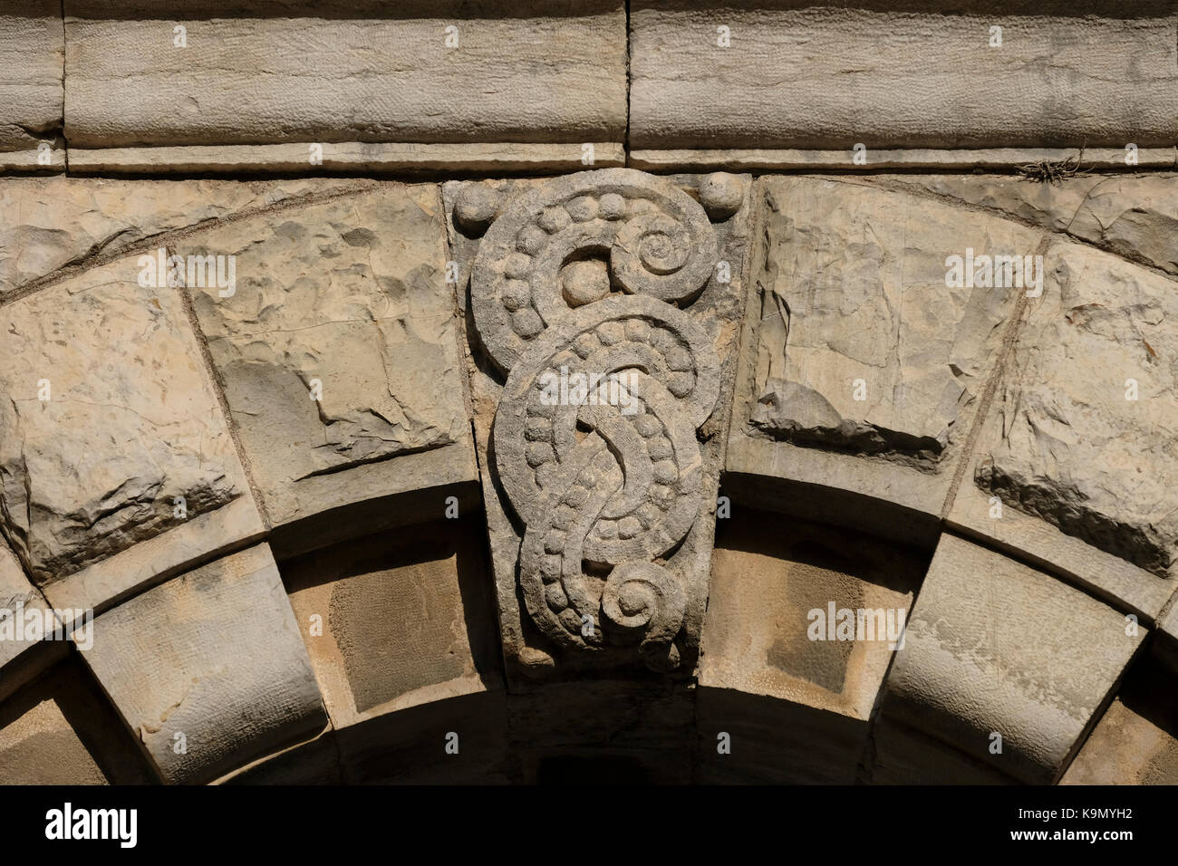 A decorated keystone above a side door of the Lutheran Church of the ...