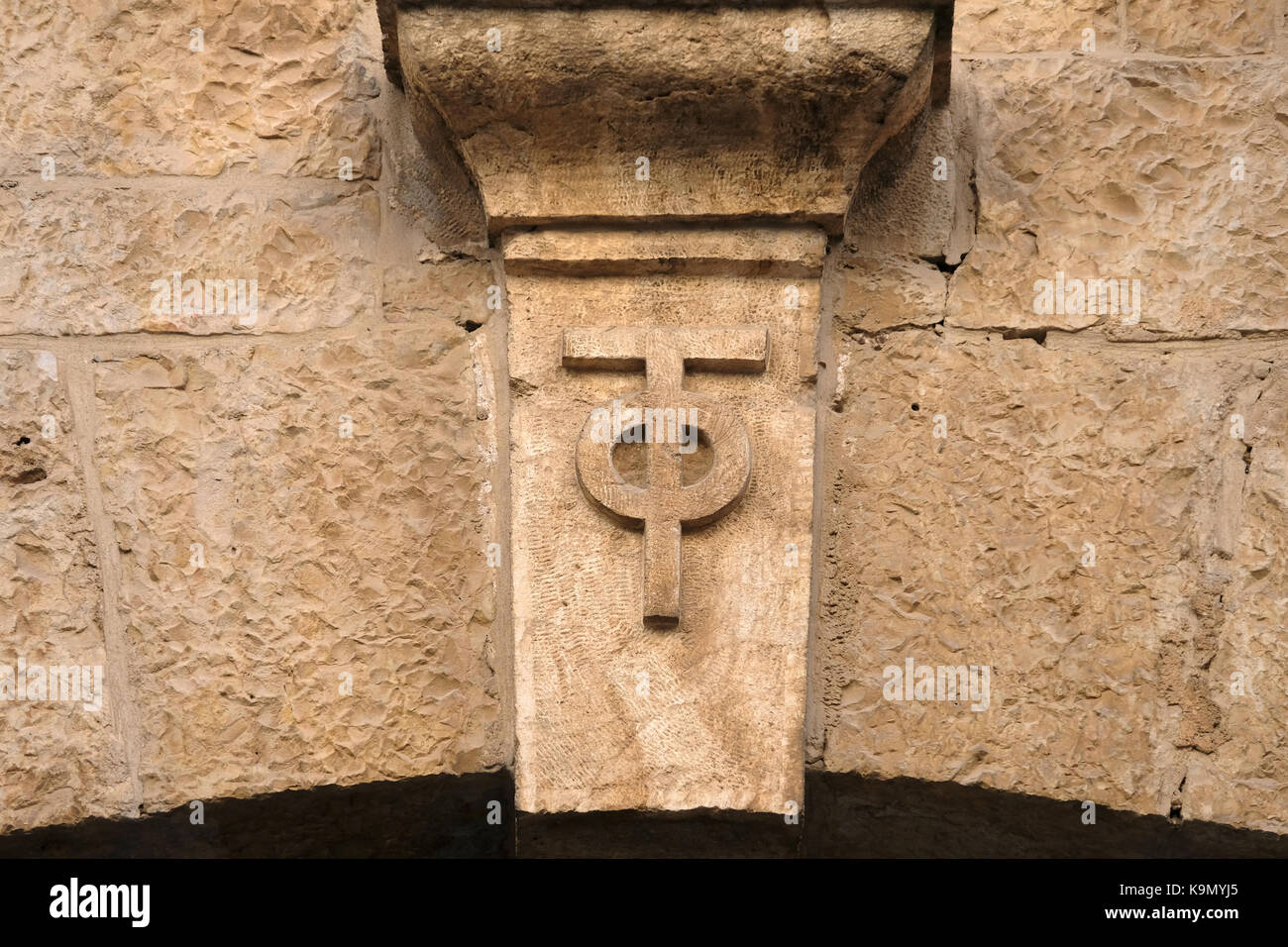 A keystone above the entrance to an old house in the Latin Patriarchate ...