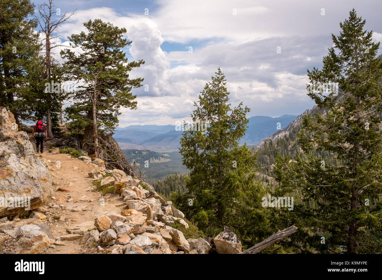 Hiking trail leads into the remote mountains Stock Photo - Alamy