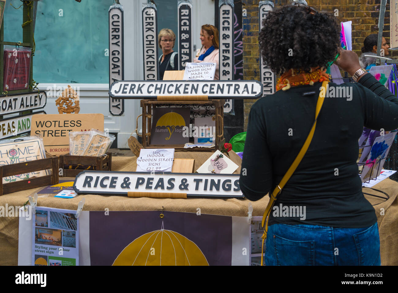 Market stall selling fun and quirky decorative signs, Portobello Road ...
