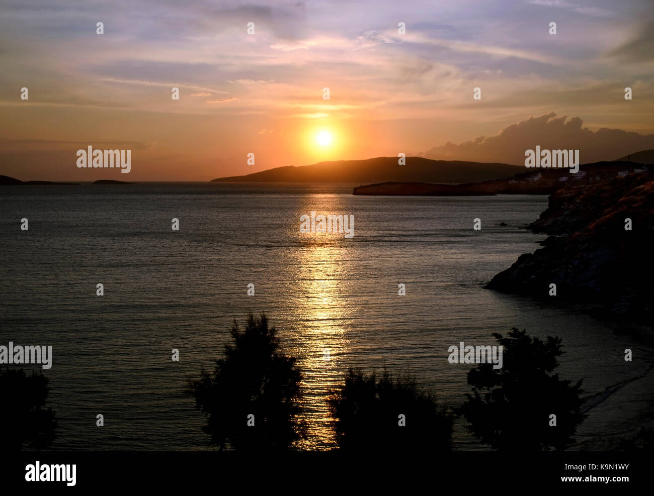 sunset in Andros island Greece Stock Photo - Alamy