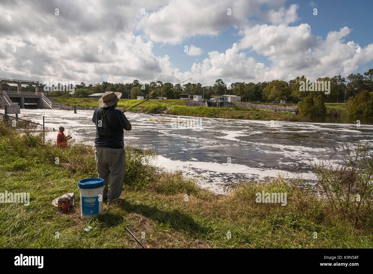 Men fishing the Moss Bluff Spillway in Marion County, Florida with the ...