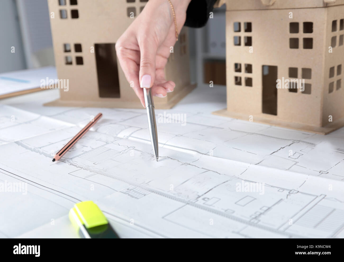 Image of new model house on architecture blueprint Stock Photo - Alamy