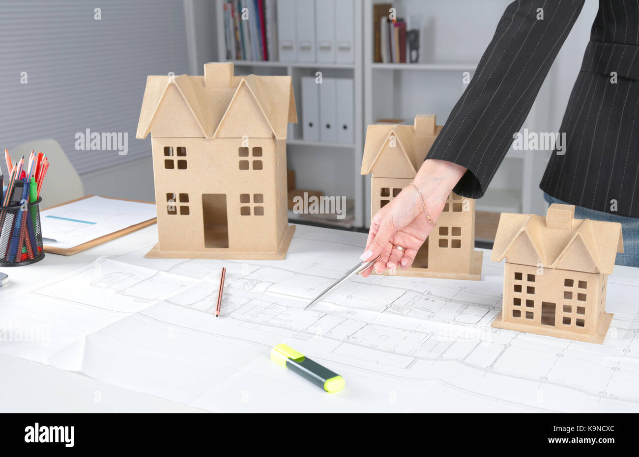 Image of new model house on architecture blueprint Stock Photo - Alamy