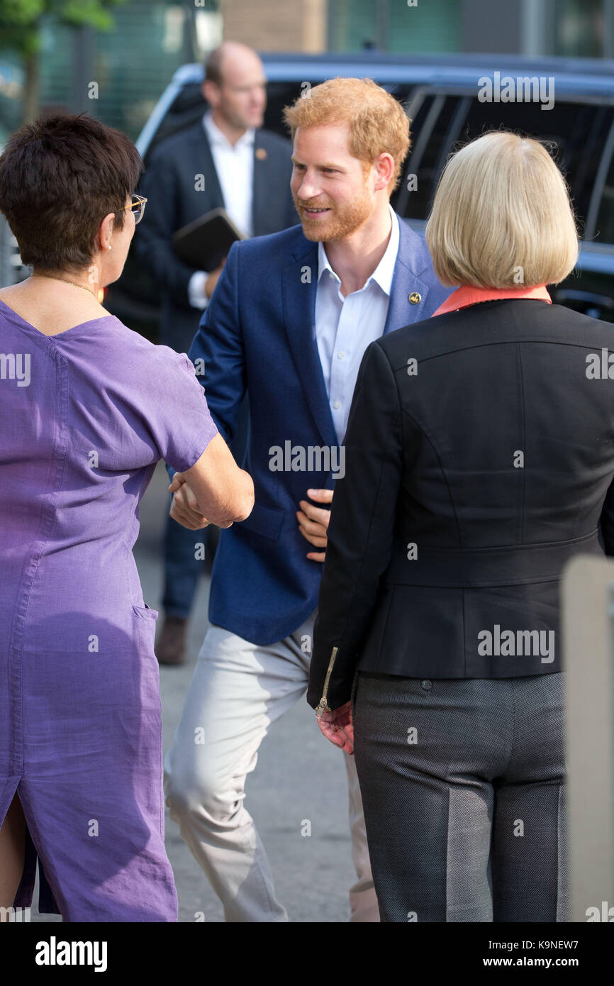 Prince Harry greets CEO Dr Catherine Zahn (left) and Foundation CEO ...