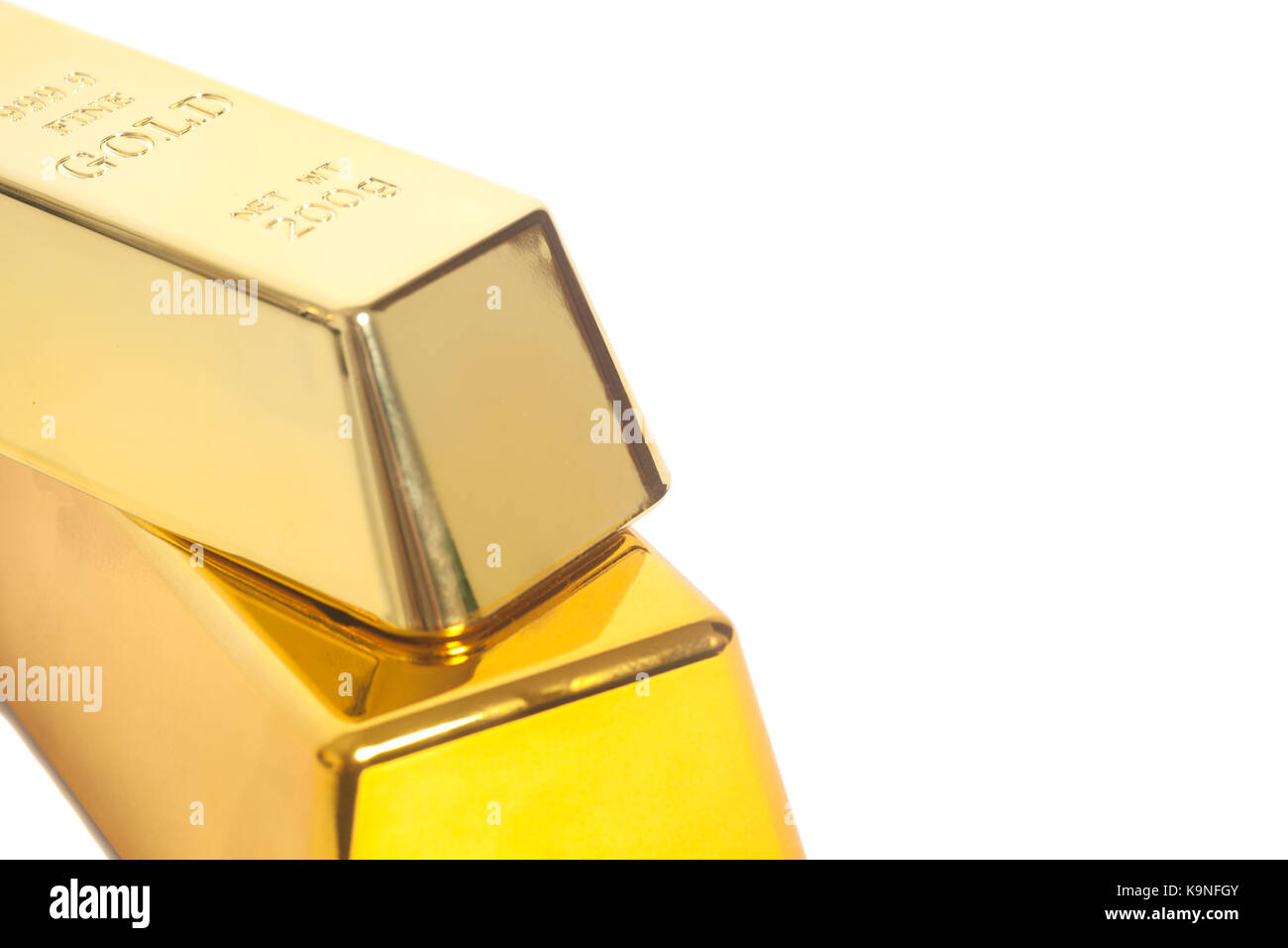 Gold bullion isolated on white background Stock Photo - Alamy
