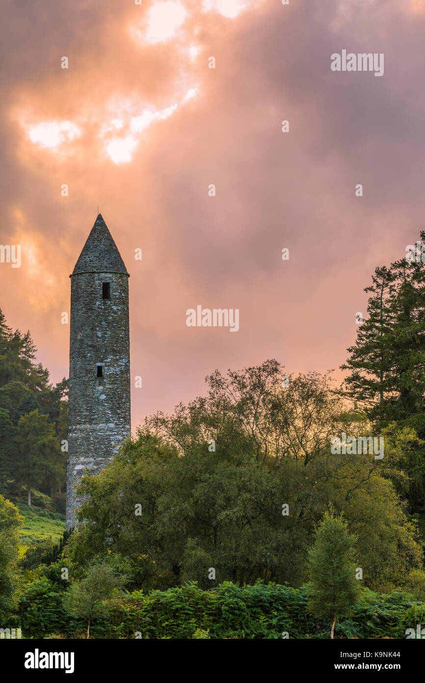The round tower at Glendalough in County Wicklow, Ireland, renowned for ...