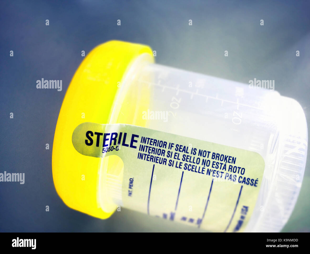 Unused and sealed sterile plastic urine sample container, USA Stock ...