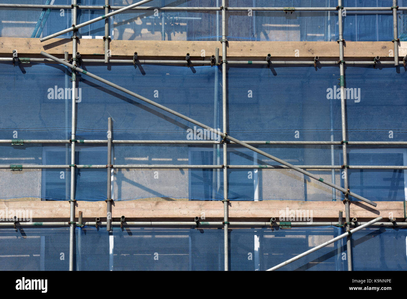 Some scaffolding erected on the front of a period building to allow ...