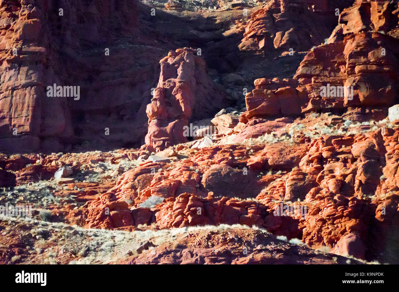 A canyon of red rock on a bright blue sky Stock Photo - Alamy