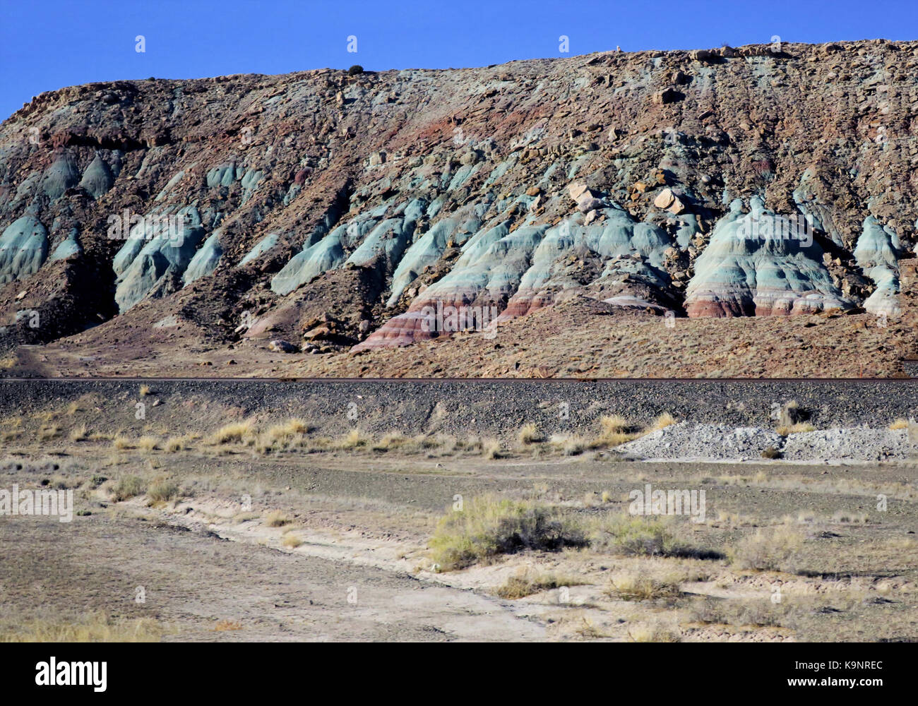 A rock formation with the mineral turquoise inset into the rock Stock ...