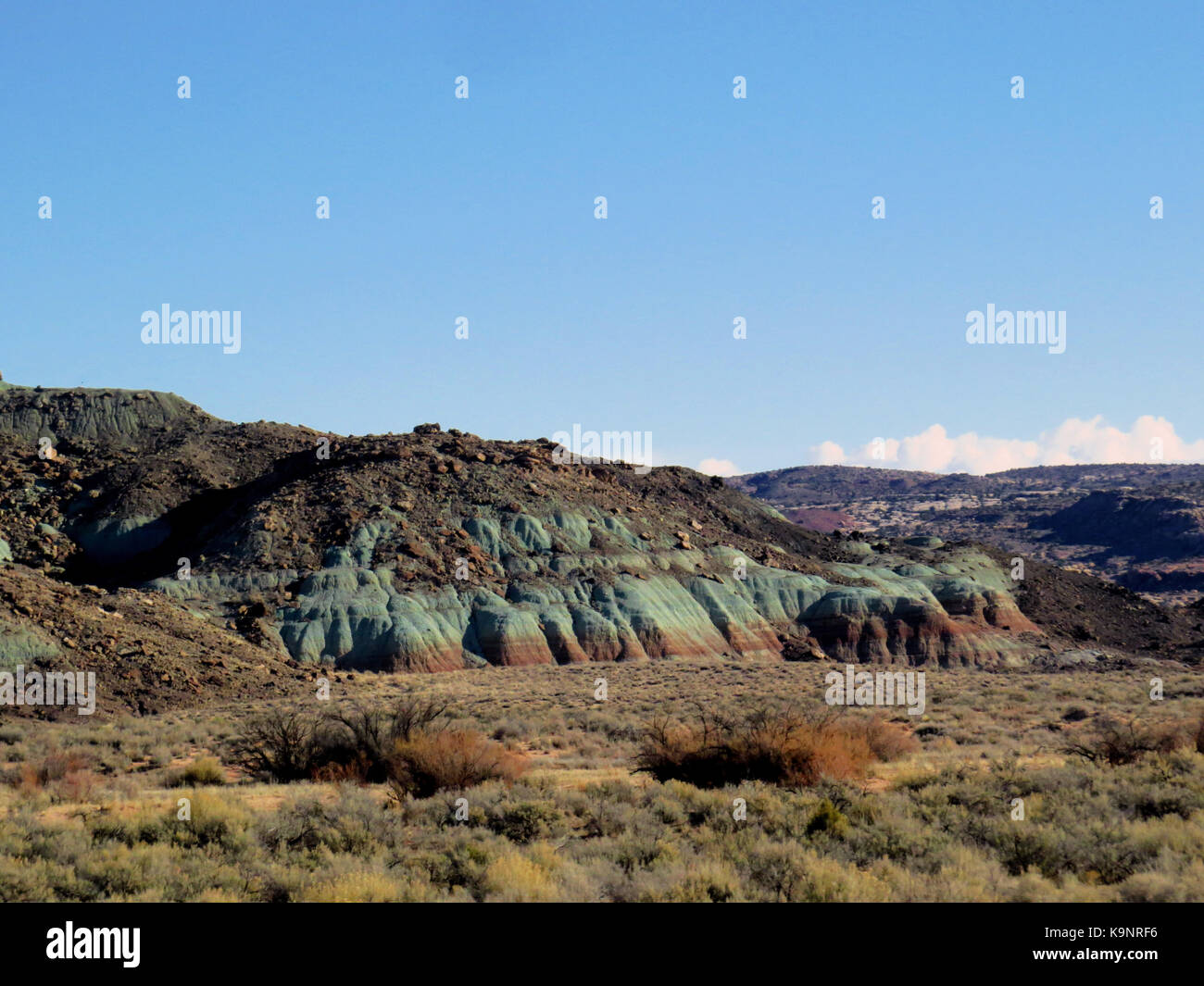 A rock formation with the mineral turquoise inset into the rock Stock ...
