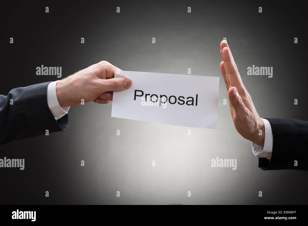 Close-up Of Man's Hand Refusing Proposal Sign On Paper Stock Photo - Alamy