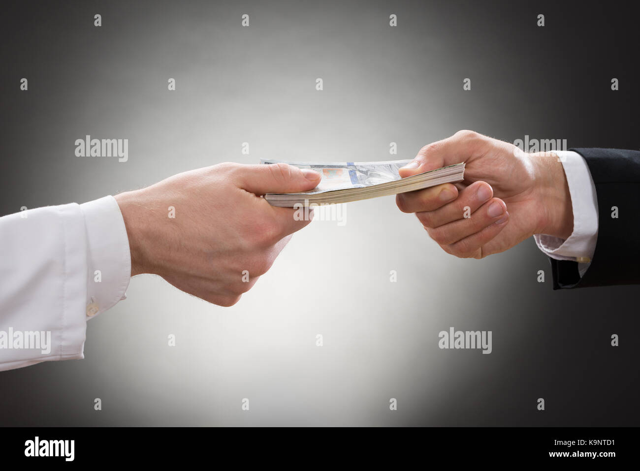 Giving money hi-res stock photography and images - Alamy