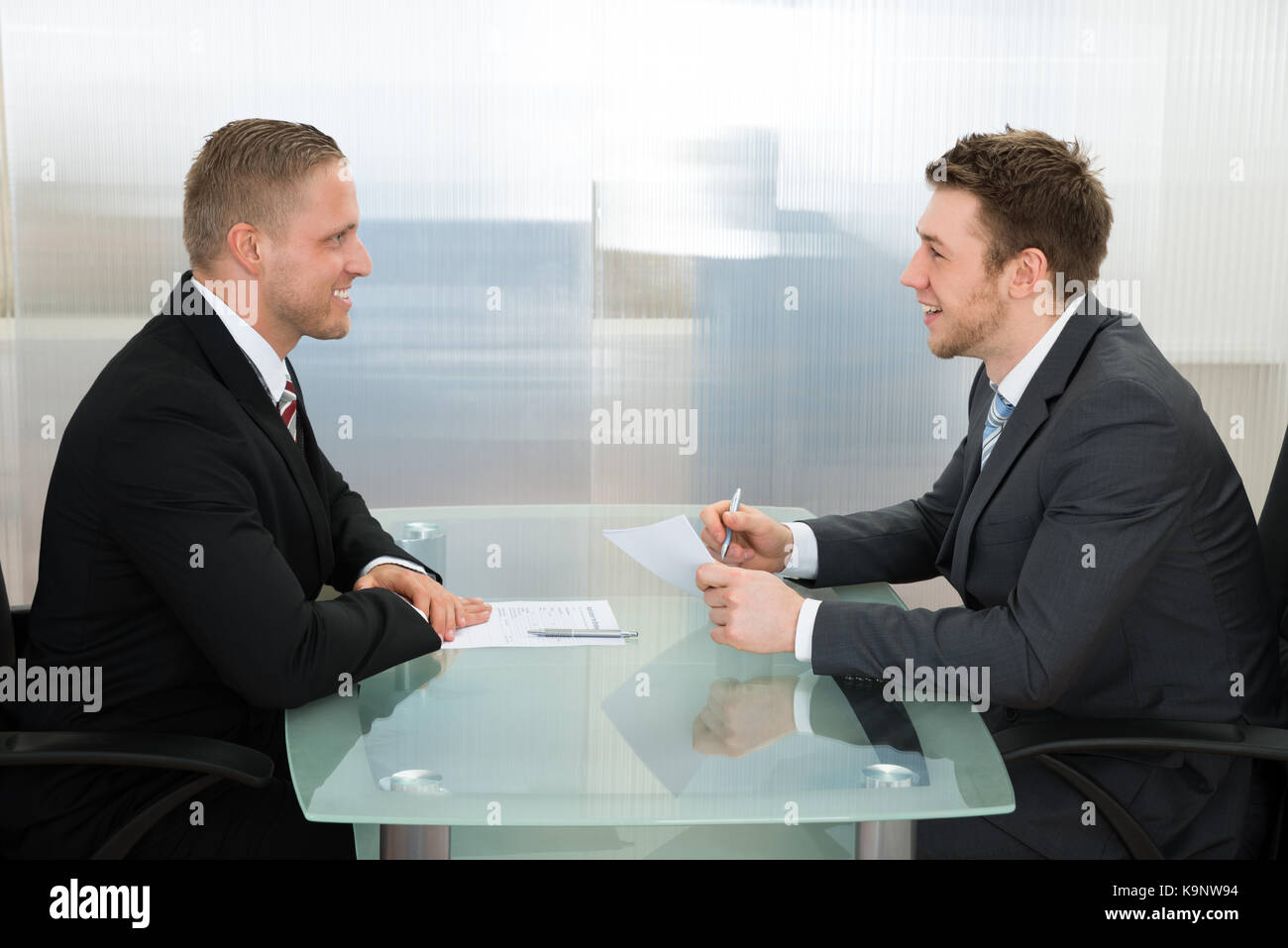 Happy Young Businessman Conducting An Employment Interview In The ...