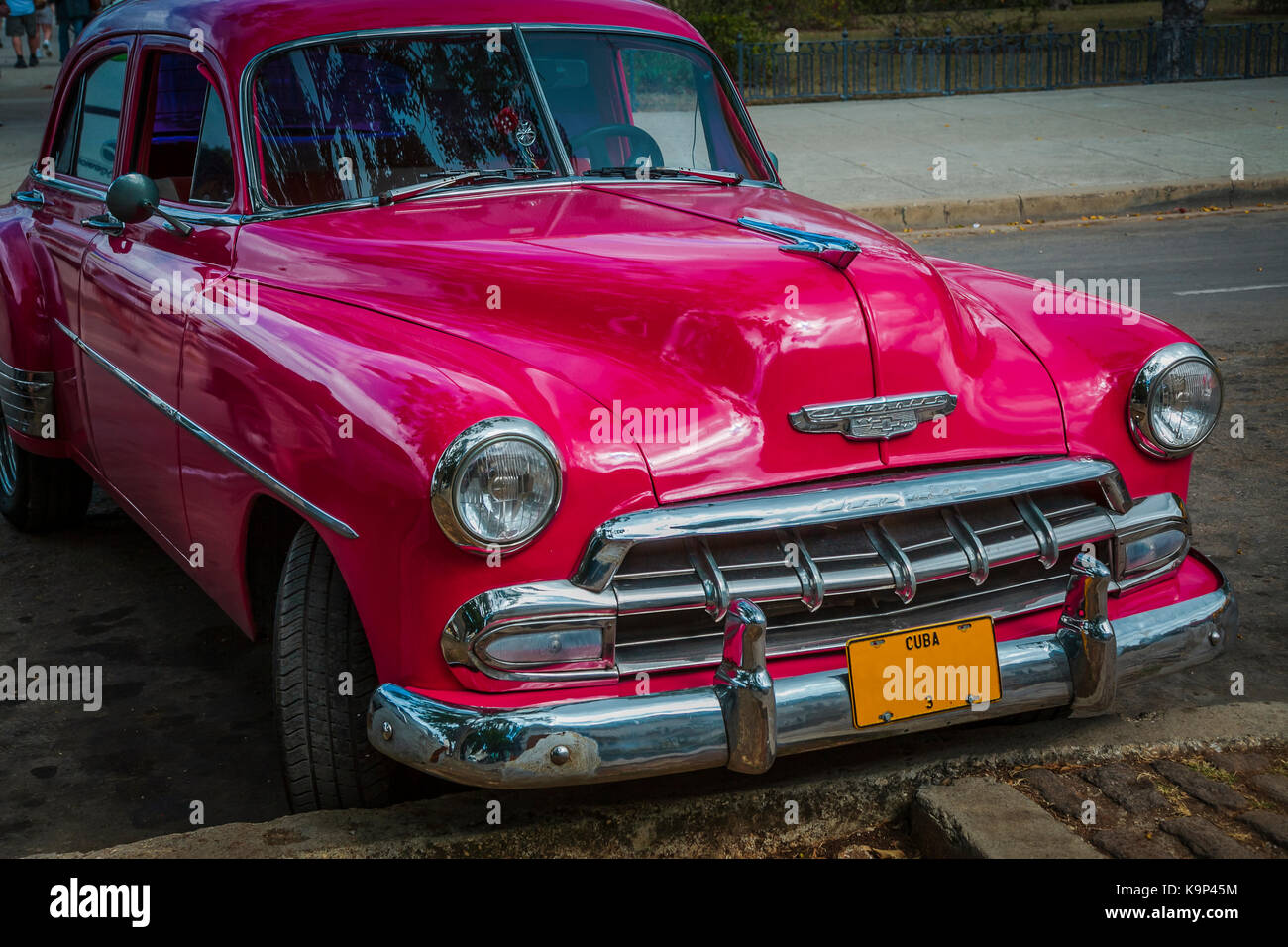 Pink Cuban antique car Stock Photo - Alamy