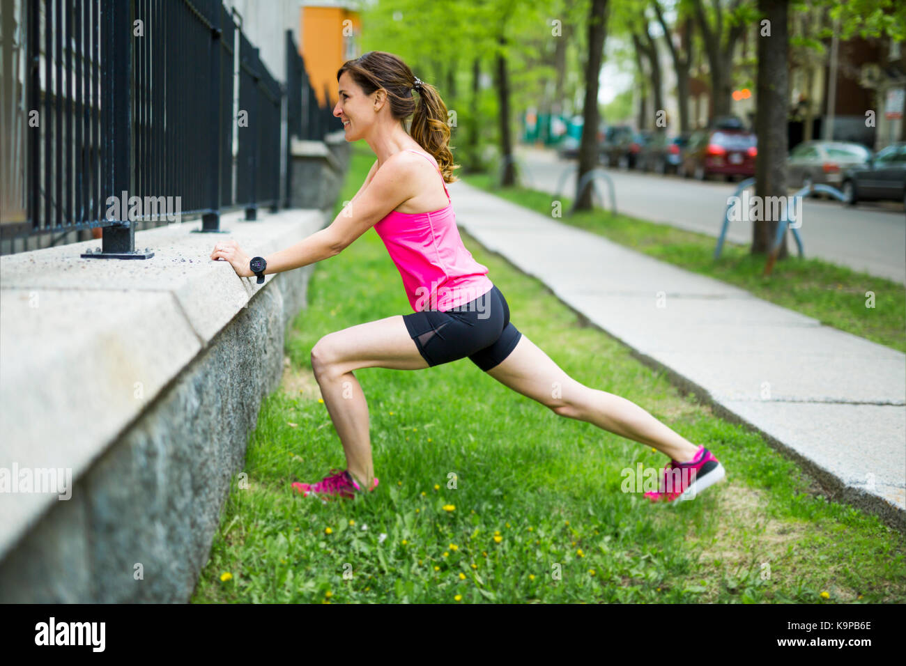 A nice portrait of a woman jogging outdoors Stock Photo - Alamy