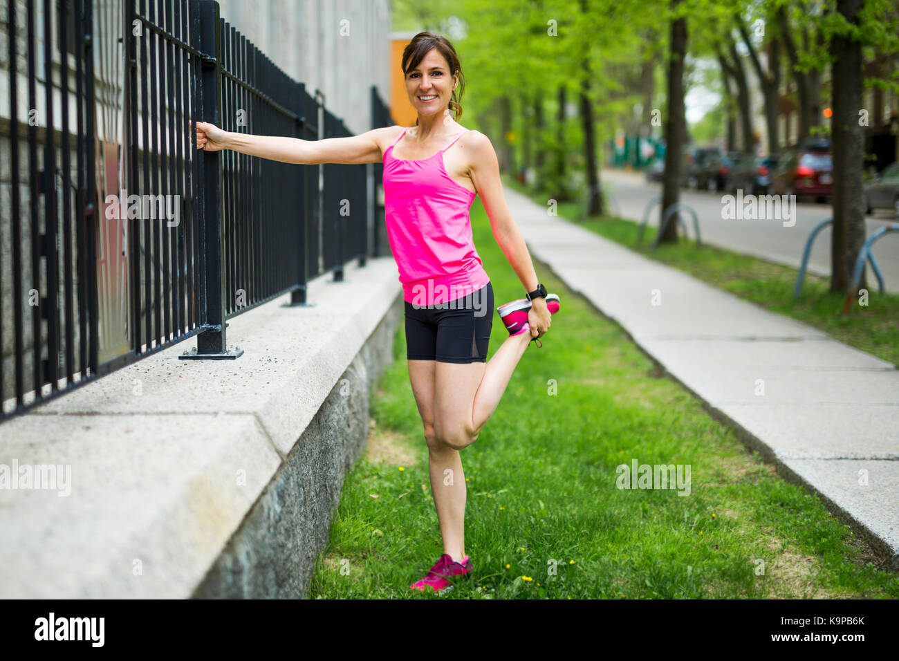 A nice portrait of a woman jogging outdoors Stock Photo - Alamy